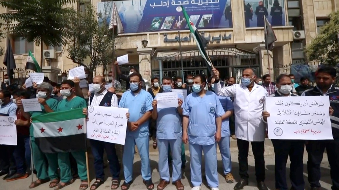 Protesters come out against Syria for board of UN health body | wcnc.com