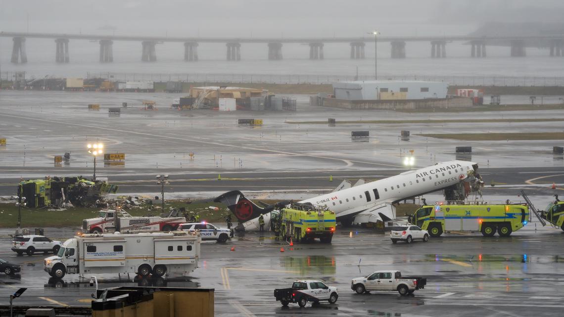 Flight attendant found buckled into seat outside plane after LaGuardia ...