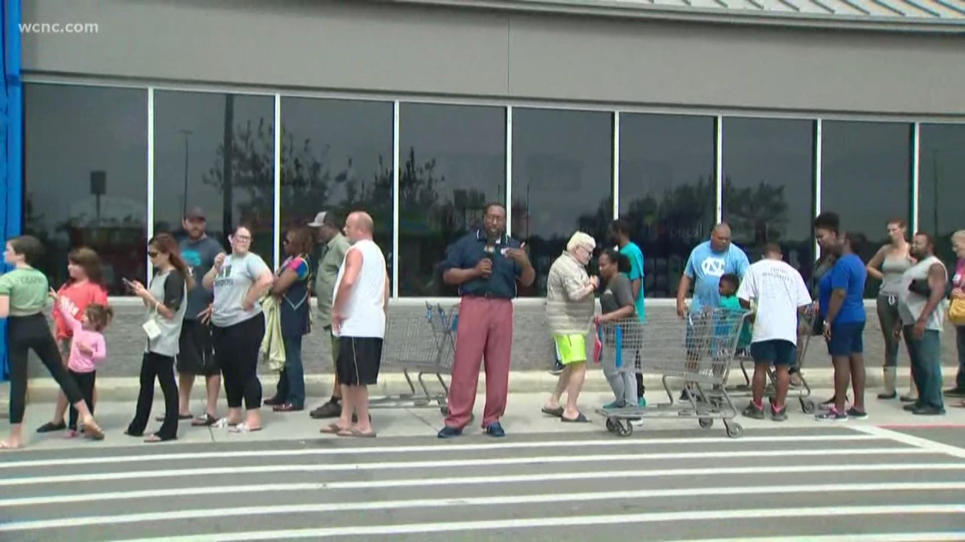 Huge line outside Walmart as clean up begins in Wilmington | wcnc.com