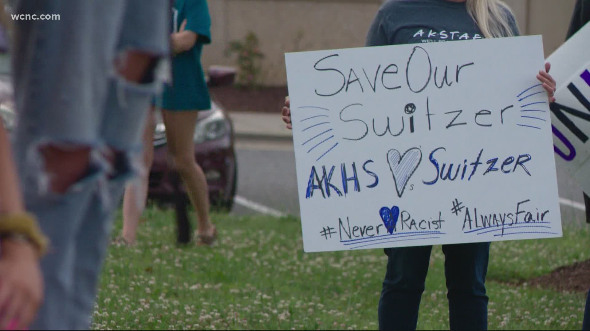 Rally held in support of Ardrey Kell Principal David Switzer | wcnc.com