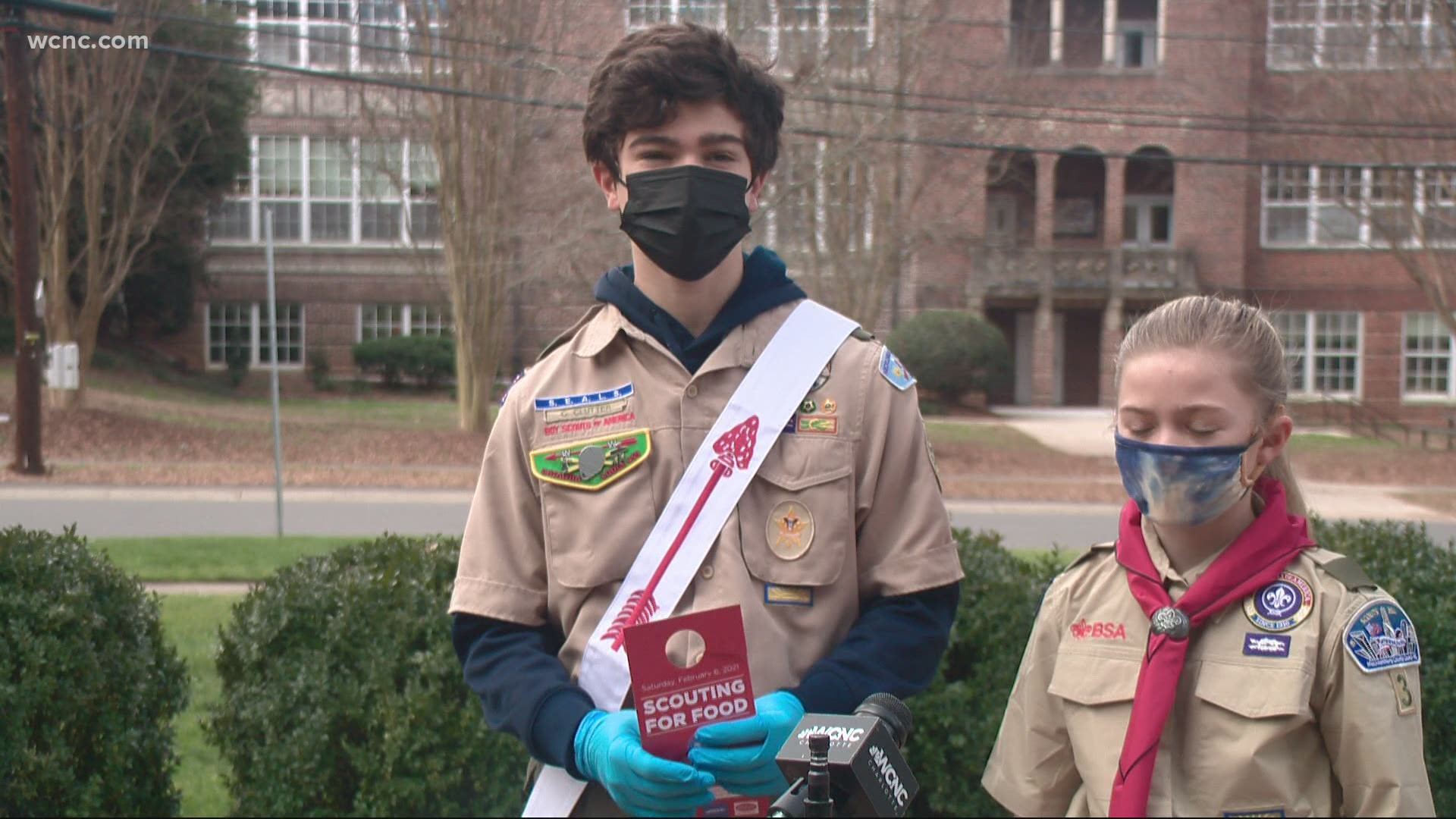 Scouts deliver door tags ahead of Scouting For Food | wcnc.com