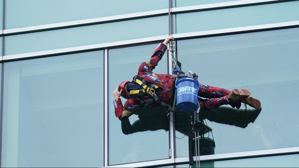 Window washers dress as superheros to surprise patients at Levine ...