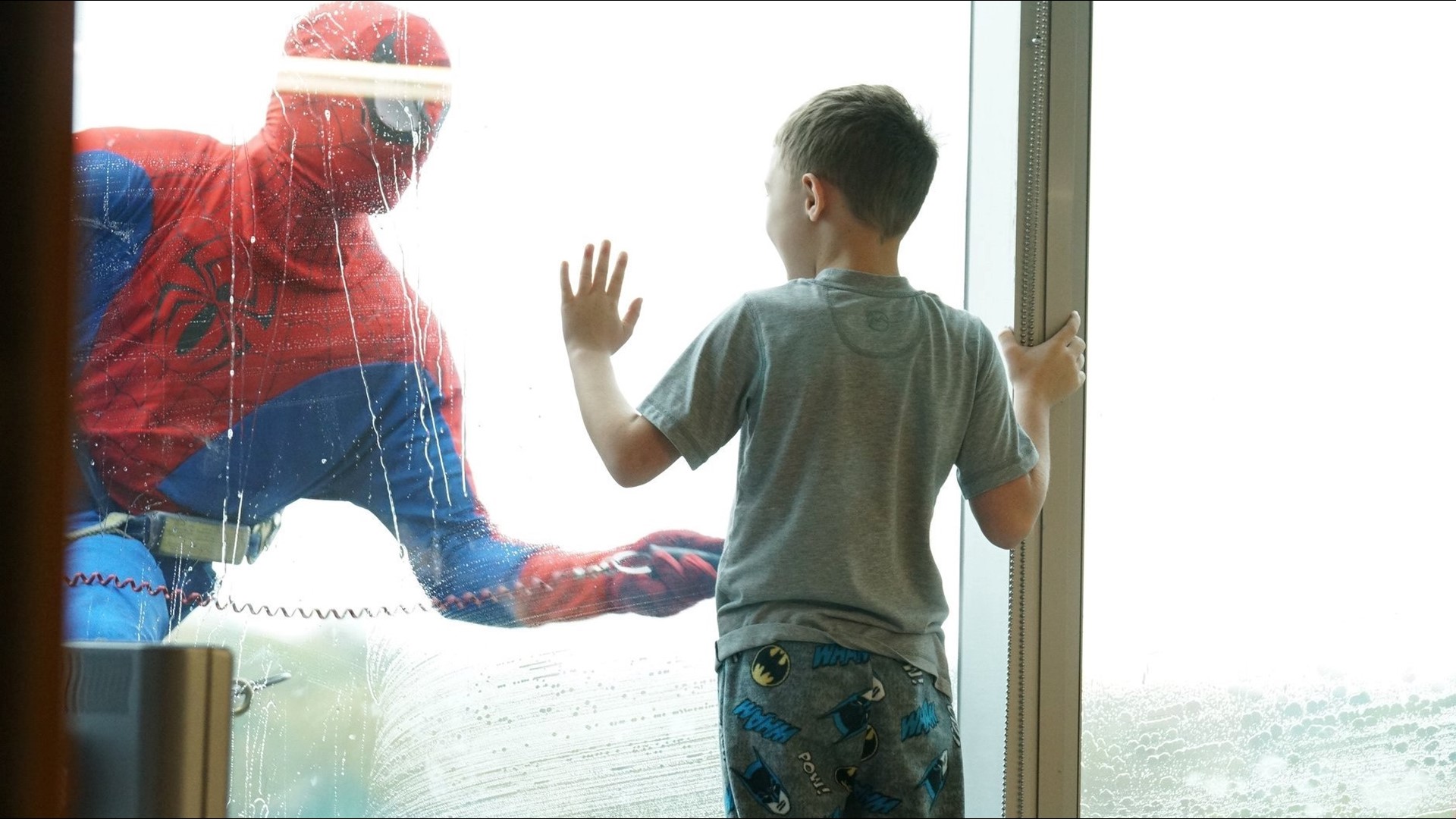 Window washers dress as superheros to surprise patients at Levine ...
