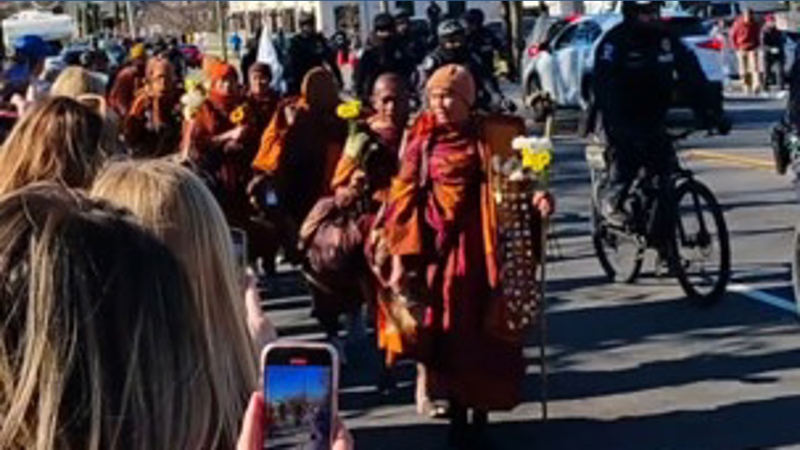 Buddhist monks march through Charlotte on peace walk | wcnc.com