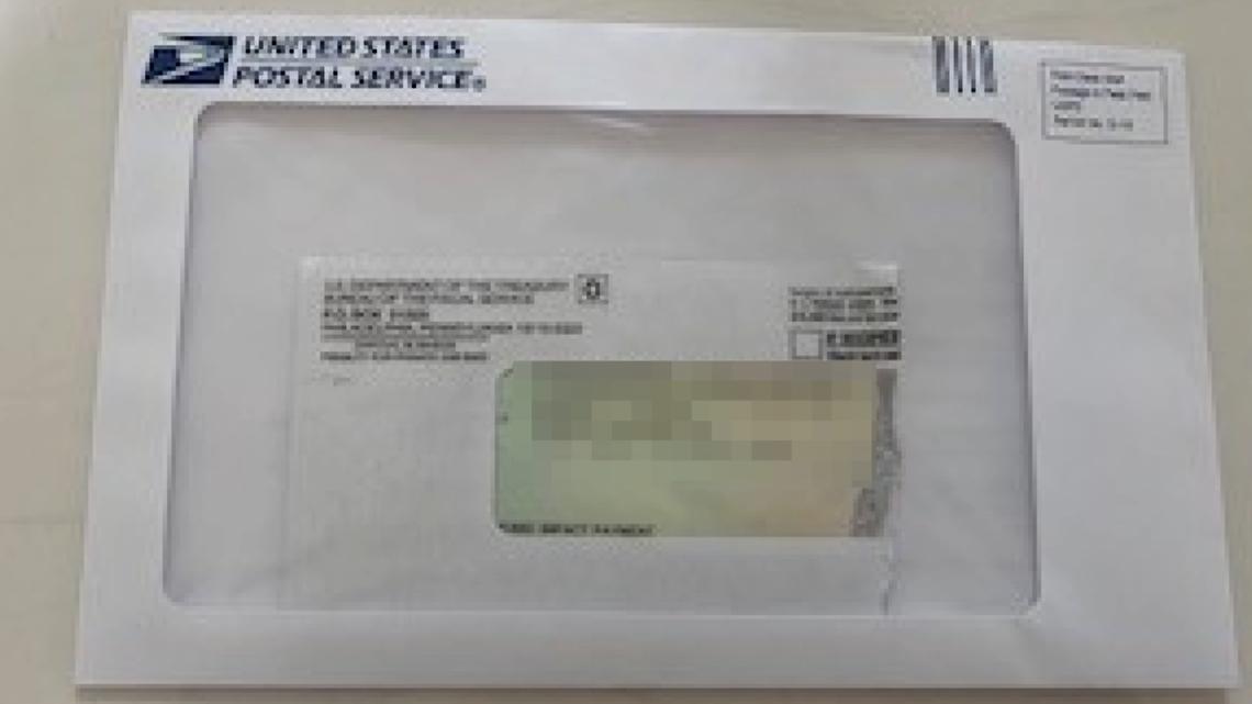 Fort Mill woman says stimulus check came ripped in half | wcnc.com