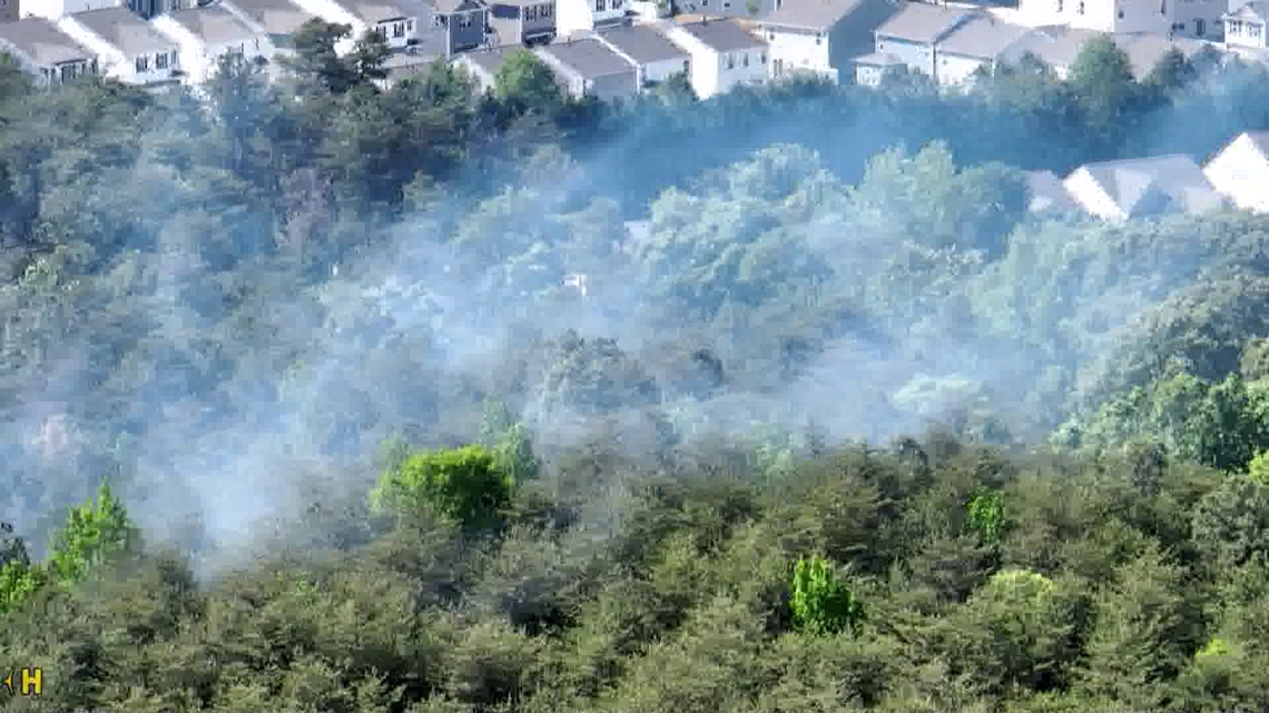 Crews respond to spreading brush fire in Steele Creek area | wcnc.com