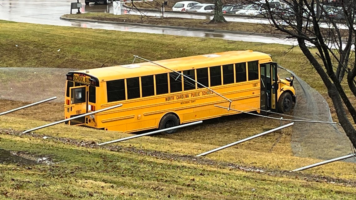 School bus crashes through fence in north Charlotte, 5 hurt | wcnc.com