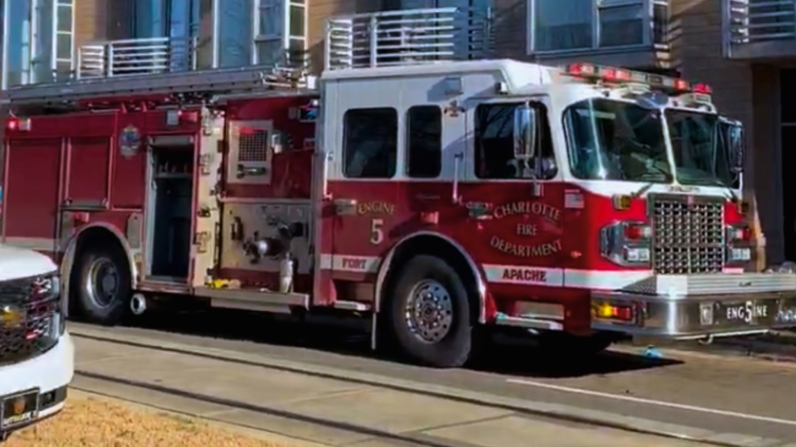 Man rescued after parachute gets tangled in Uptown high-rise | wcnc.com