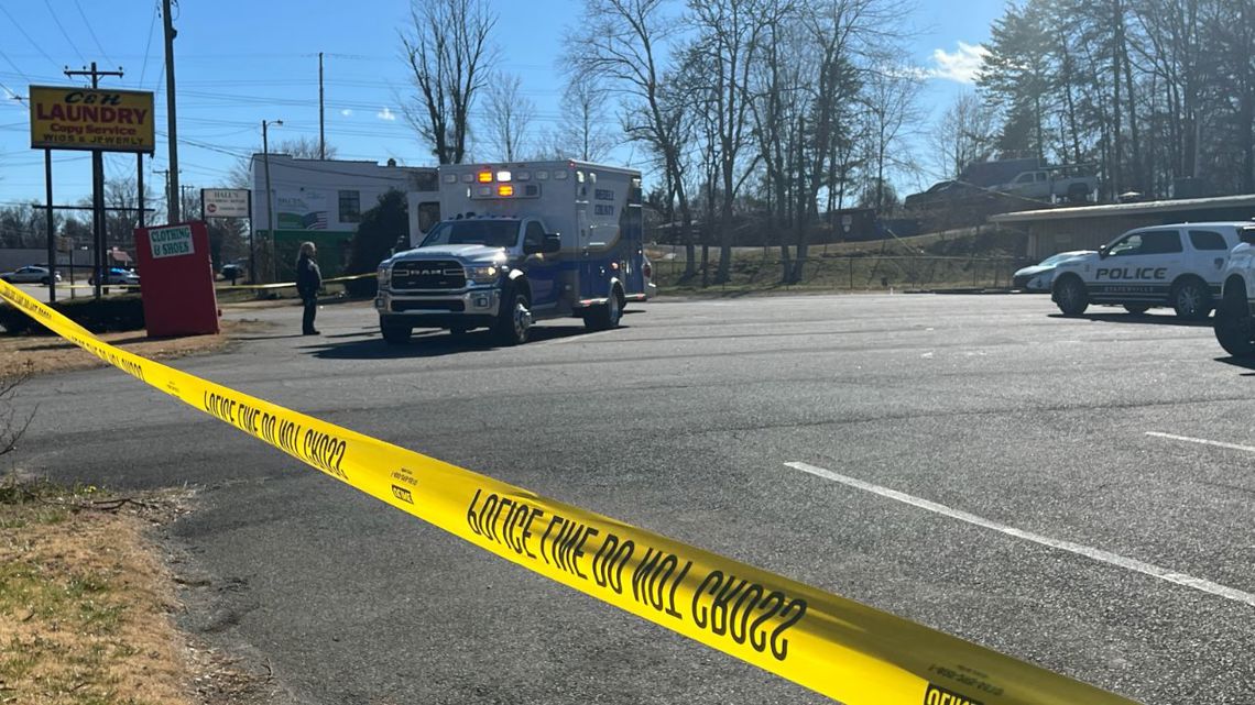 Person killed after car crashes into laundromat, causing fire in ...