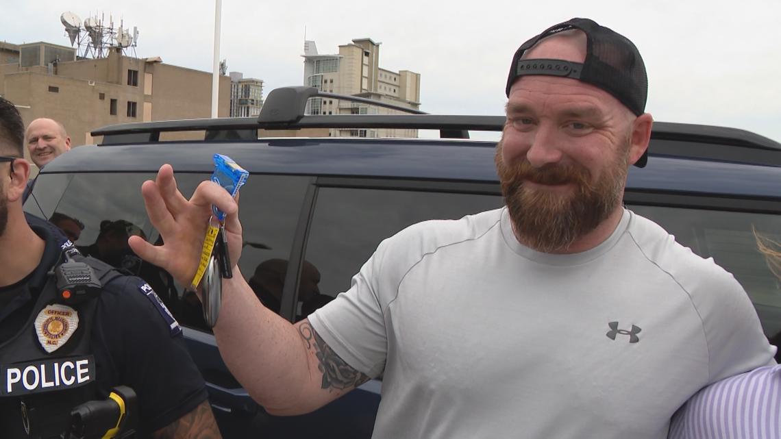 CMPD officer who responded to deadly ambush surprised with new car | wcnc.com