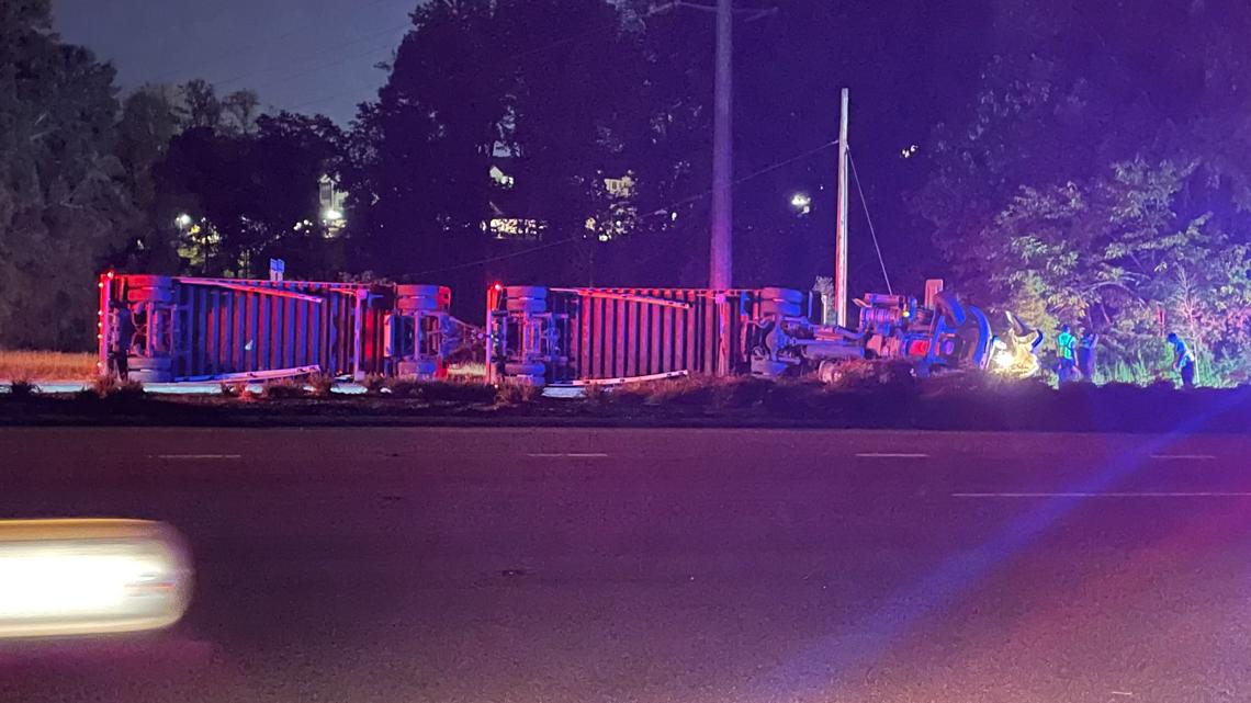 Overturned 18-wheeler blocks lanes of W. T. Harris Boulevard | wcnc.com