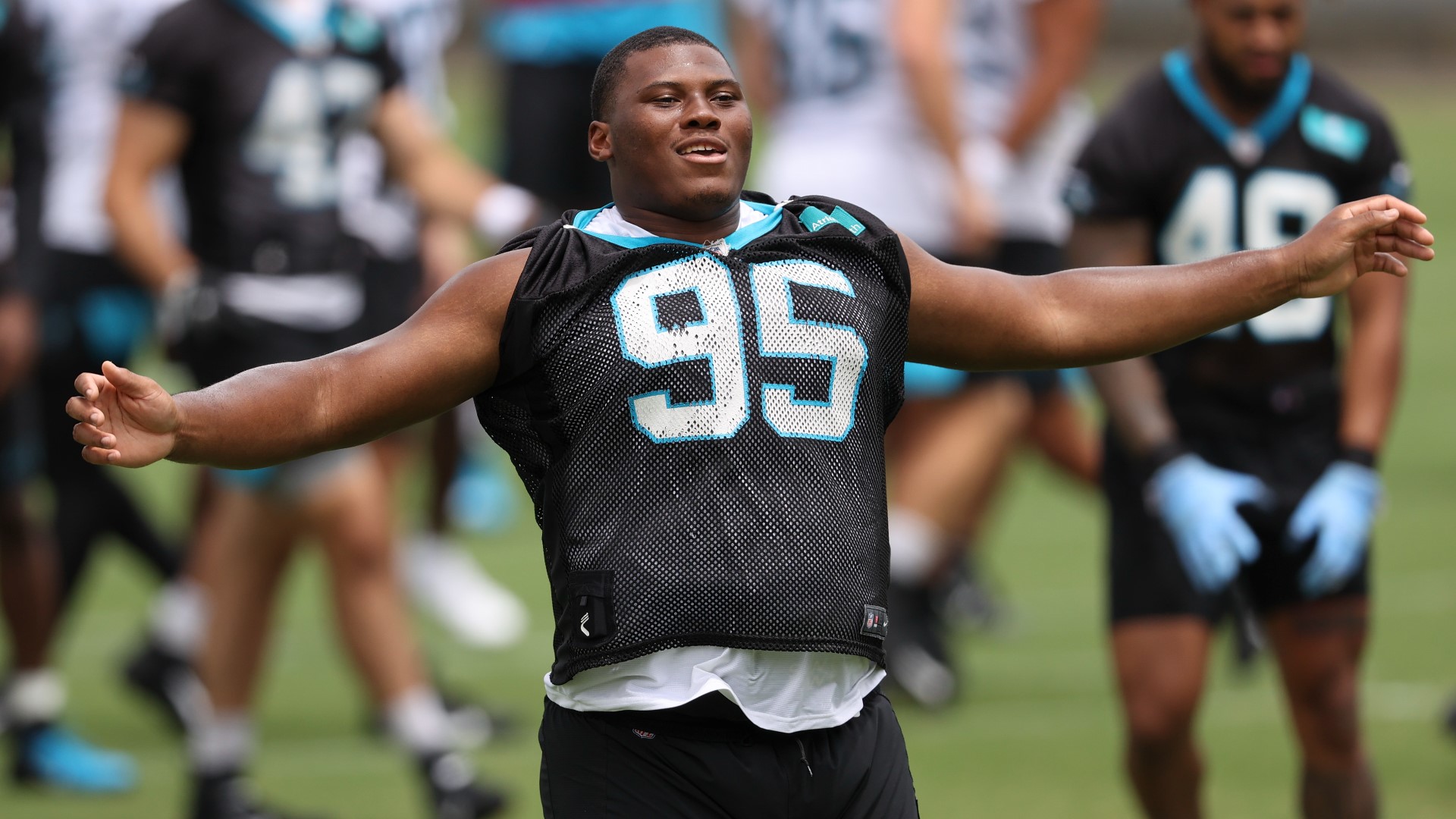 Charlotte foster kids receive gifts from Panthers' Derrick Brown | wcnc.com