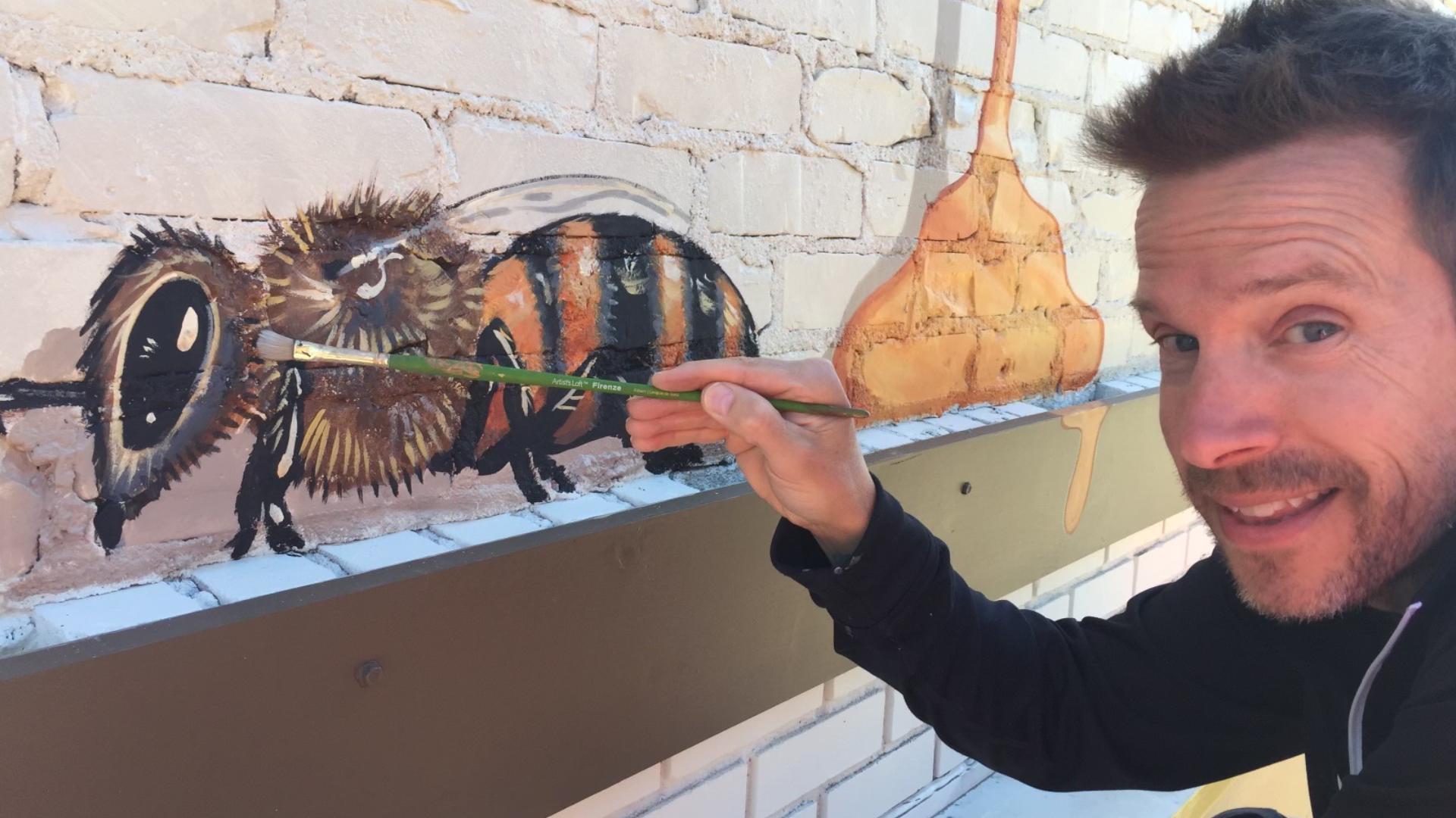 Artist on a mission to paint 50,000 bees across the world | wcnc.com
