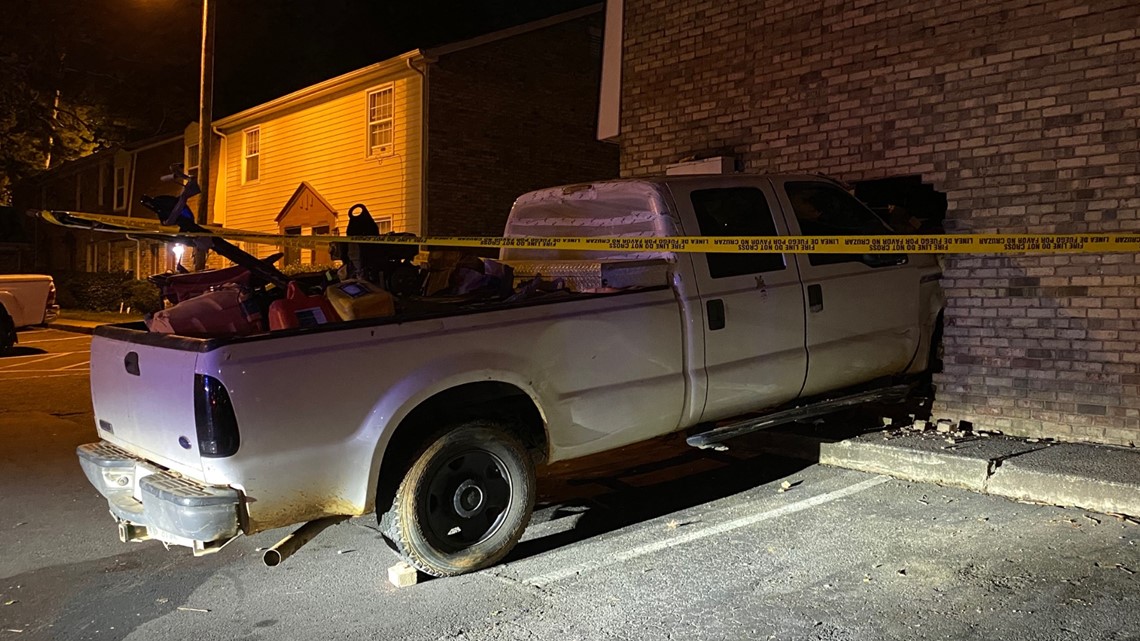 Officials investigating after pick-up truck crashes into building ...