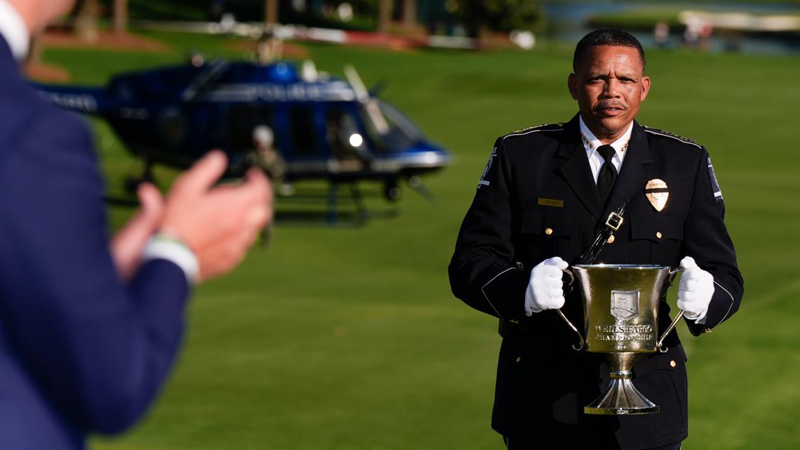 Charlotte police chief delivers Wells Fargo Championship trophy | wcnc.com