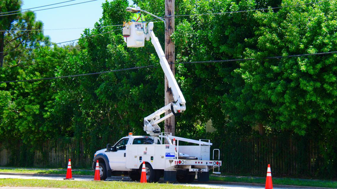 Man charged with stealing boom truck with worker suspended in air ...