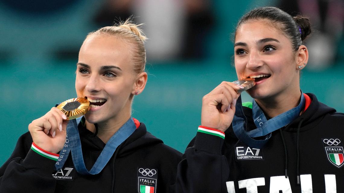Italy scores first Olympic women's gymnastics gold | wcnc.com