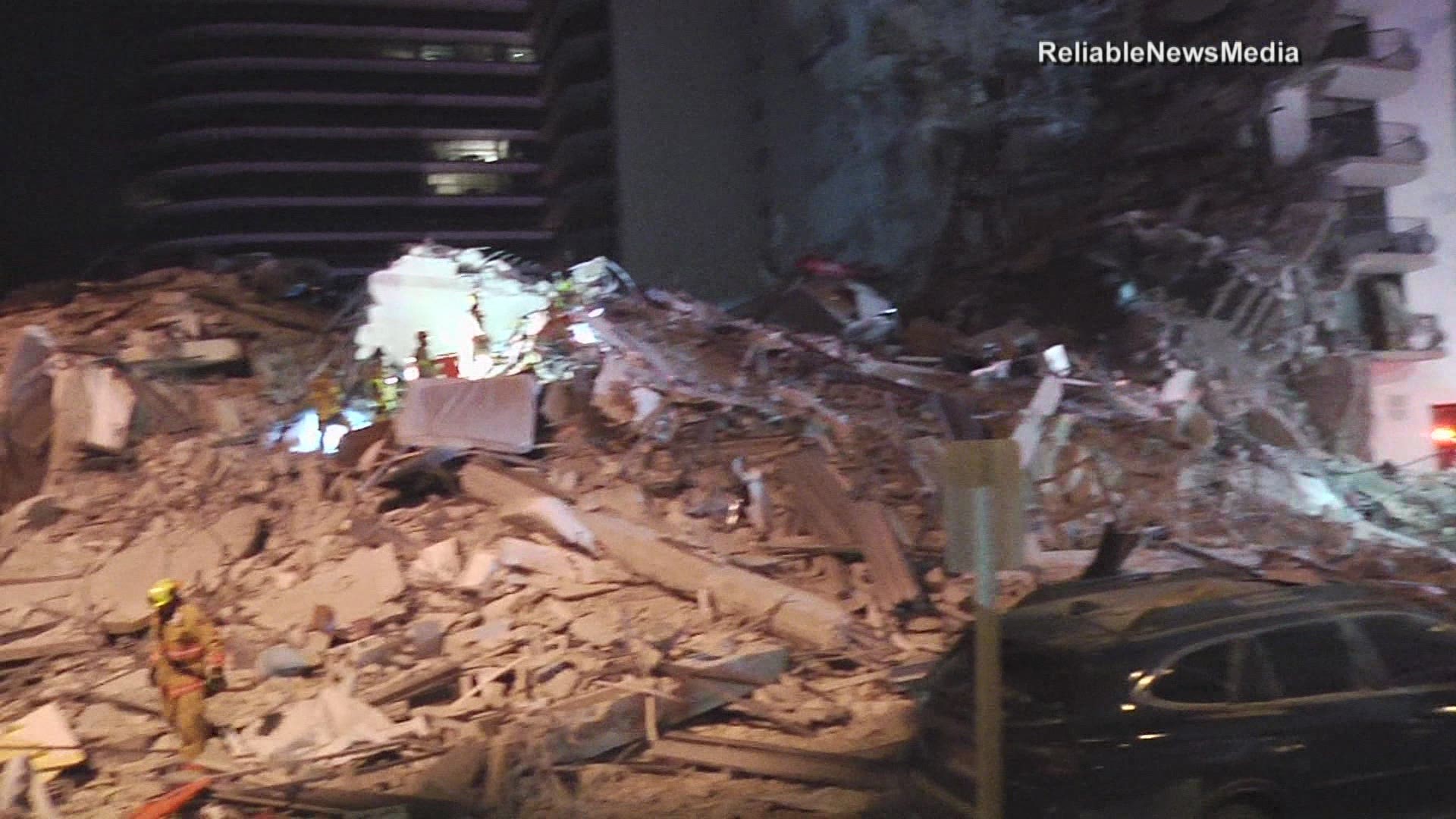 WATCH: Rescue efforts underway after high-rise building partially ...