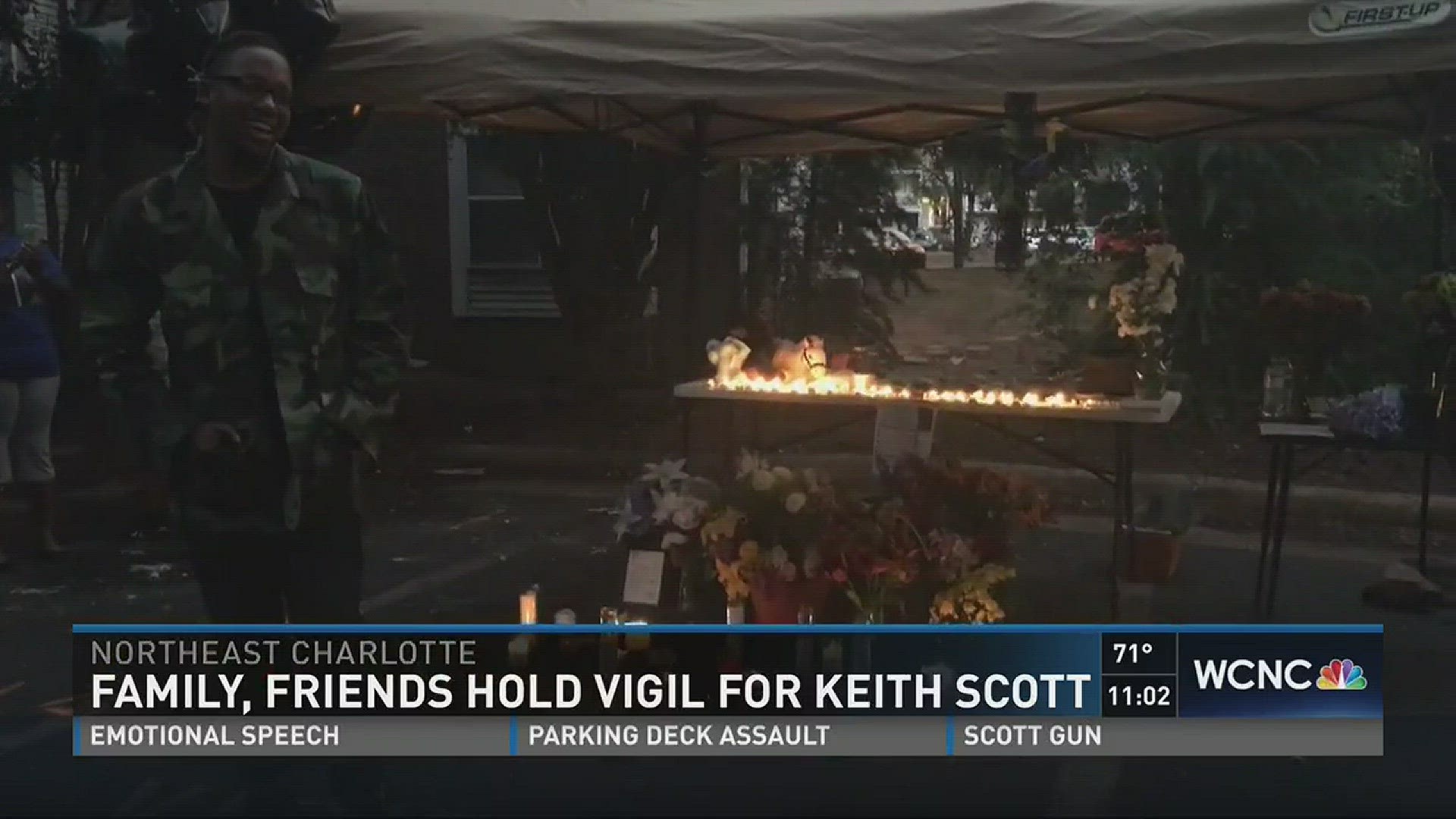 Neighbors hold vigil to remember Keith Scott | wcnc.com
