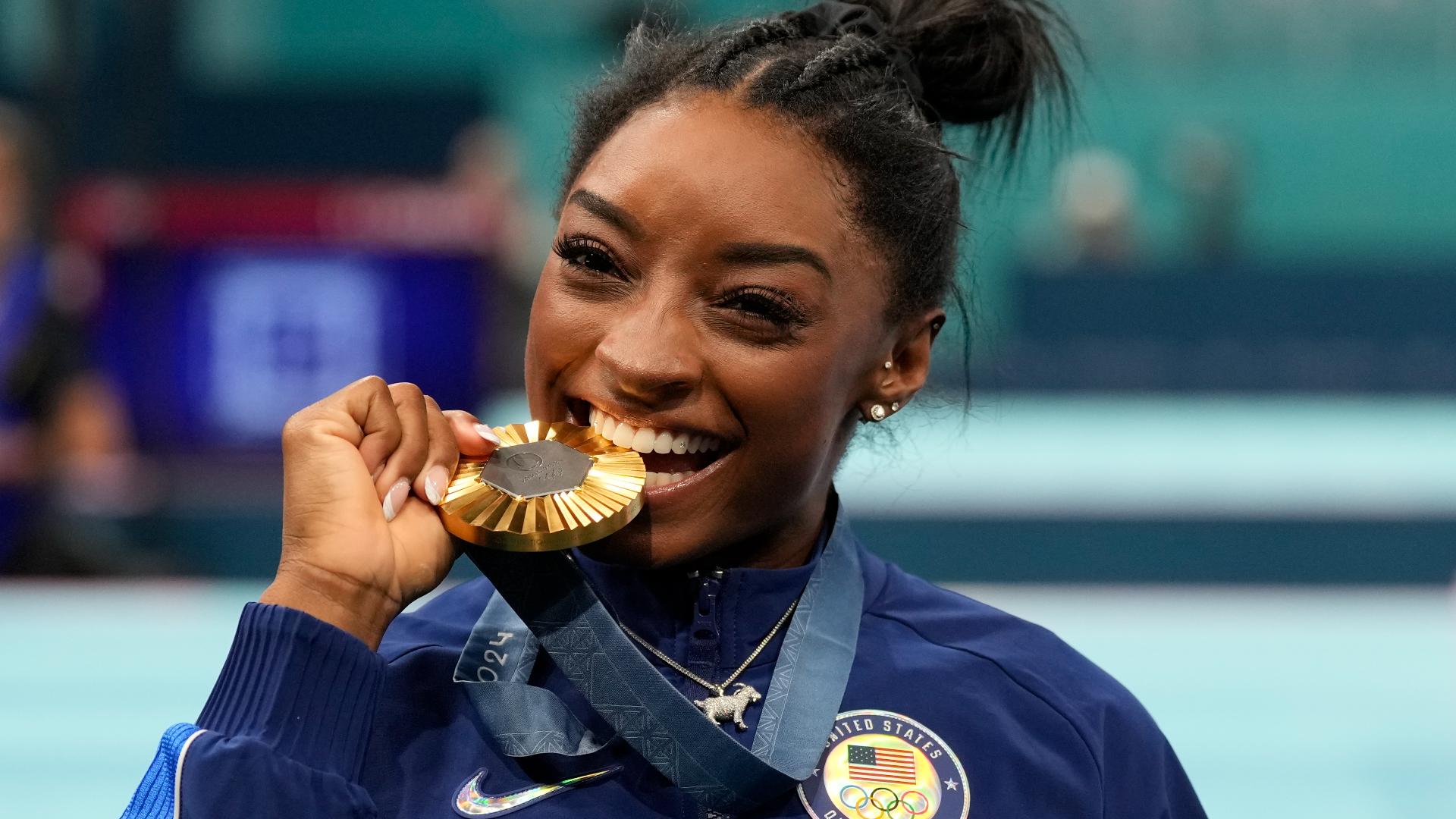 Simone Biles wears goat chain as she won 6th Olympics gold medal | wcnc.com